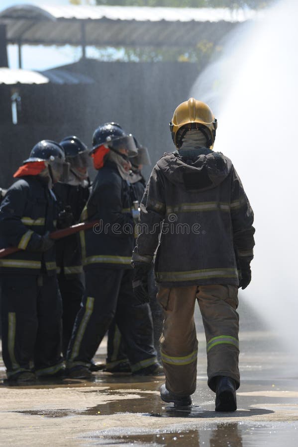 Fire fighting training. stock photo. Image of adult, protection - 43959964