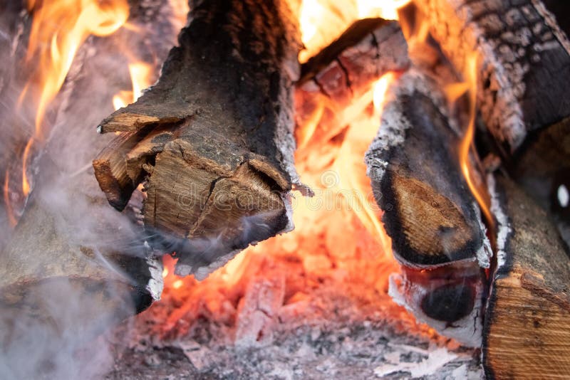Fire in the Fireplace with Firewood and Coal. Firewood is Burning Stock ...