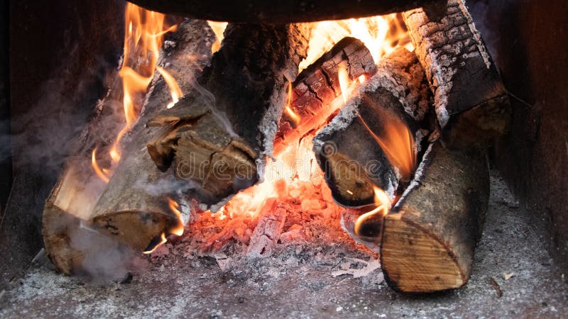 Fire in the Fireplace with Firewood and Coal. Firewood is Burning Stock ...