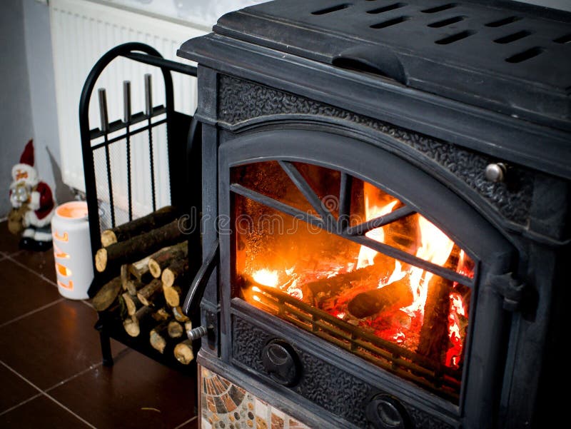 Fire in the Fireplace with Logs of Wood and Santa Claus Stock Photo ...