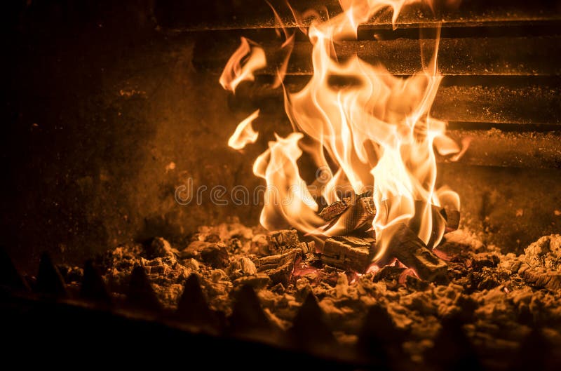 Warm fire in the fireplace stock image. Image of modern - 129767601