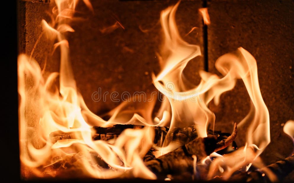 Fire in the fireplace stock image. Image of desktop - 227047417