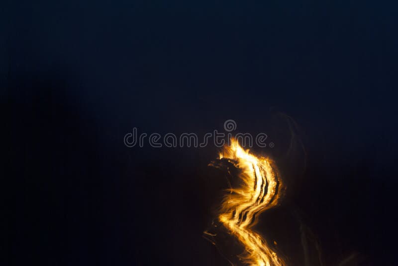 Fire Flames Outdoors on Night Beach. Effect of Movement and Sweeping ...