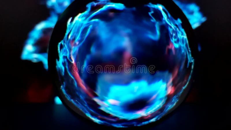 Fire Flashes of a Multi-colored Flame. View through a Crystal Ball ...
