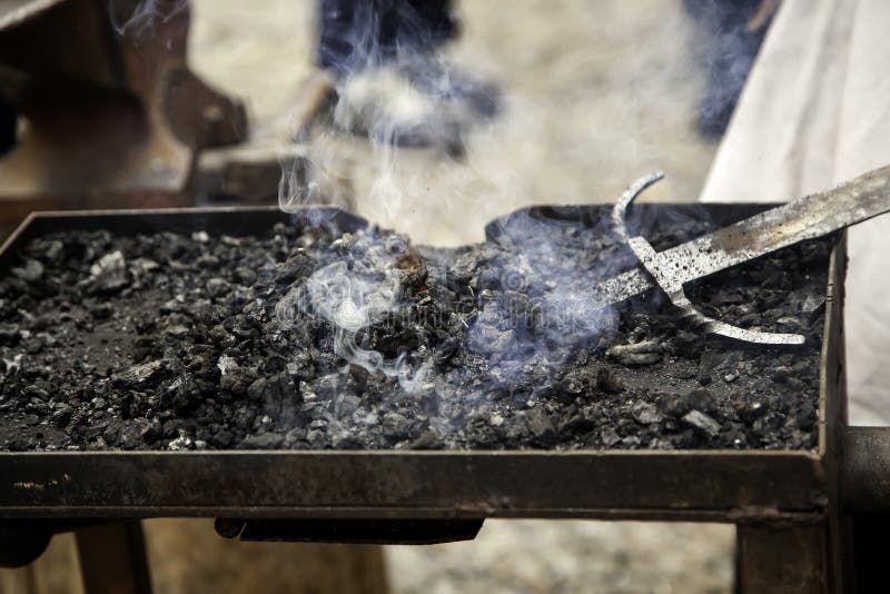Fire in the forge stock photo. Image of craft, burning - 180011058
