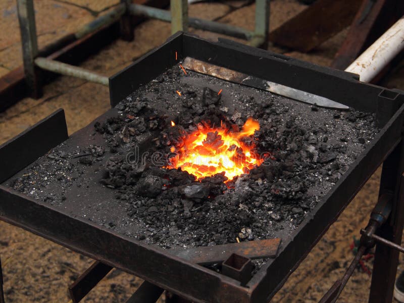 Fire in a Forge stock photo. Image of occupation, light - 64589614