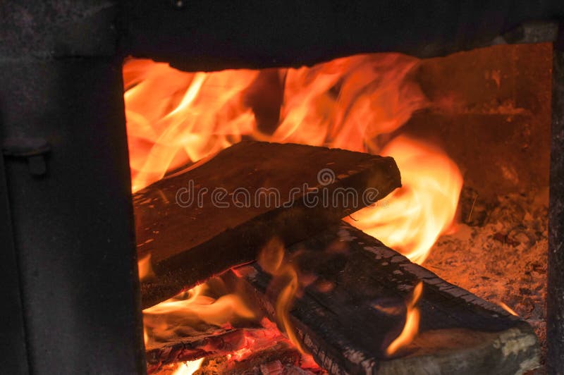 Fire in the furnace stock image. Image of ember, blazing - 147583379