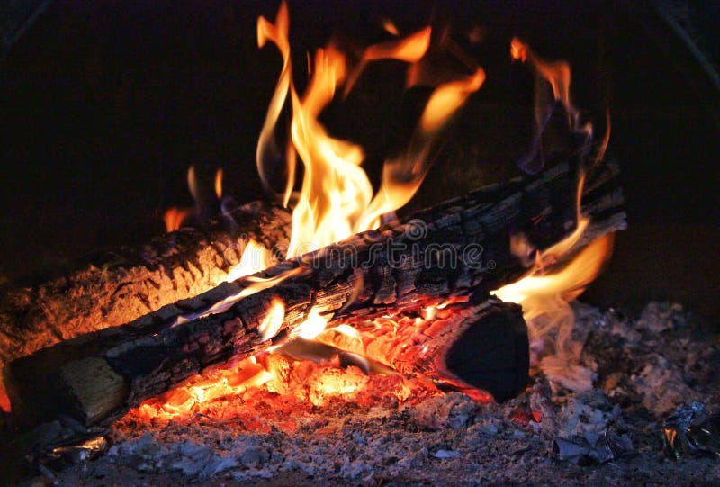 Fire in the furnace stock photo. Image of fireplace - 144055726