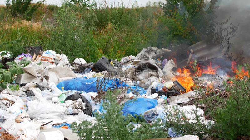 Fire at the Garbage Dump. Burning Garbage, Ecology in Danger Stock ...