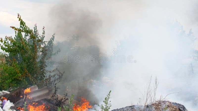 Fire at the Garbage Dump. Burning Garbage, Ecology in Danger Stock ...