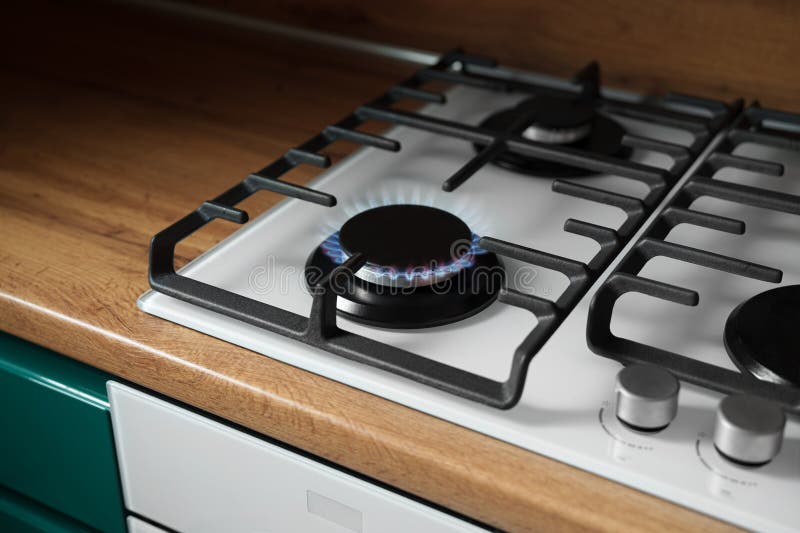 A Fire on a Gas Stove. Cooking Gas is a Danger. Deficit. Kitchen Stock ...