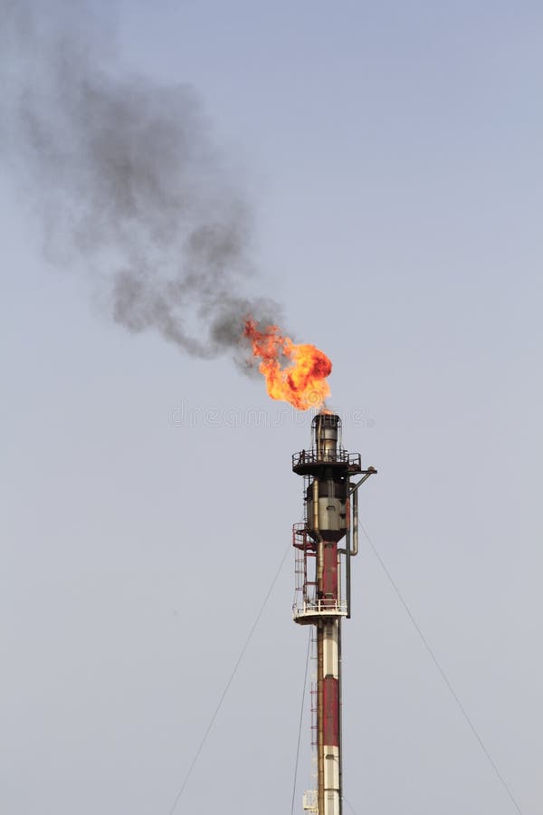 Fire from a Gas Torch, in a Large Oil Refinery Stock Image - Image of ...
