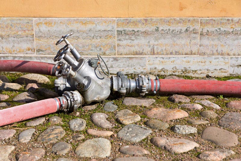 The Fire Gate a Tee and Hoses for Water Stock Image - Image of metal ...