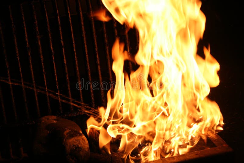 Fire on the grill stock photo. Image of flames, tongues - 10769674