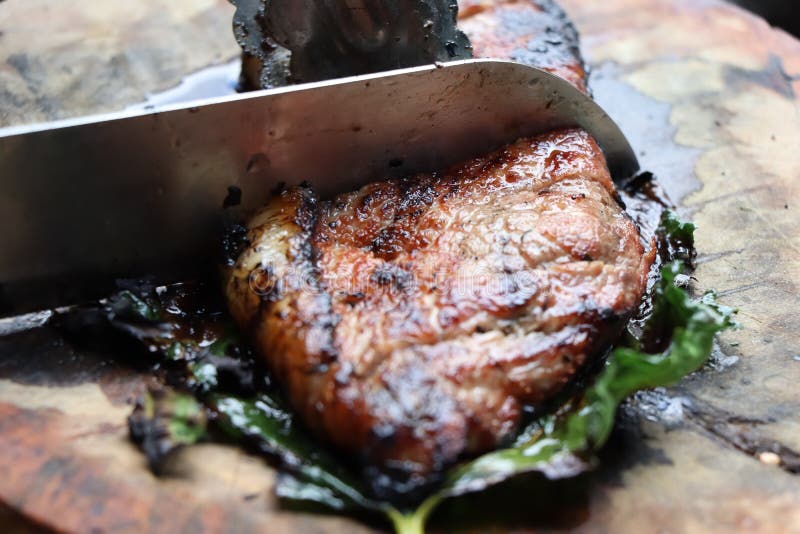 Fire grilled meat stock photo. Image of safe, black - 232302840