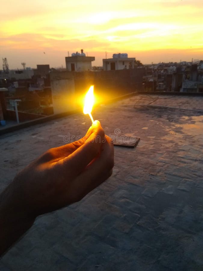 Fire in hand stock photo. Image of hand, fire, sunset - 179730814