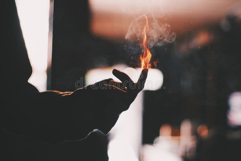Fire stock photo. Image of bokeh, hand, fire, focused - 154300076