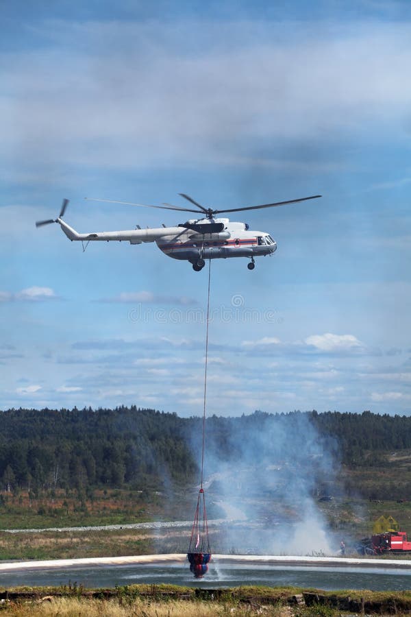 Fire helicopter stock photo. Image of helicopter, firefighter - 52860082