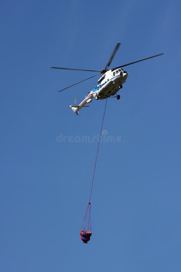 Fire helicopter in flight stock photo. Image of firefighter - 146444232