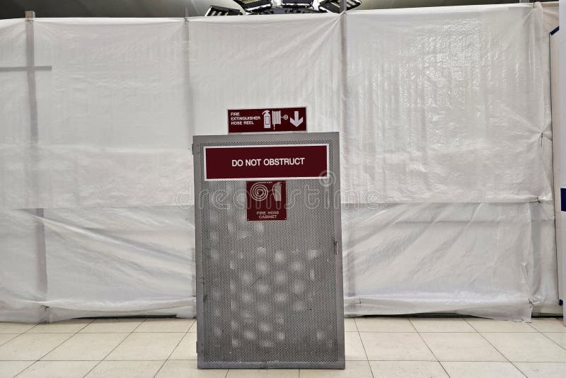 Fire Hose Cabinet in the Construction Area. Editorial Stock Photo ...