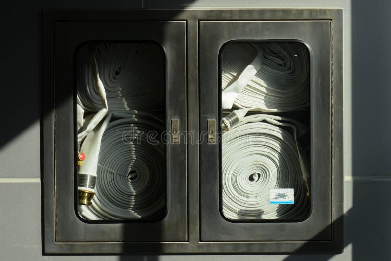 Fire Hose Hanging on the Wall. Stock Image - Image of danger, fire ...