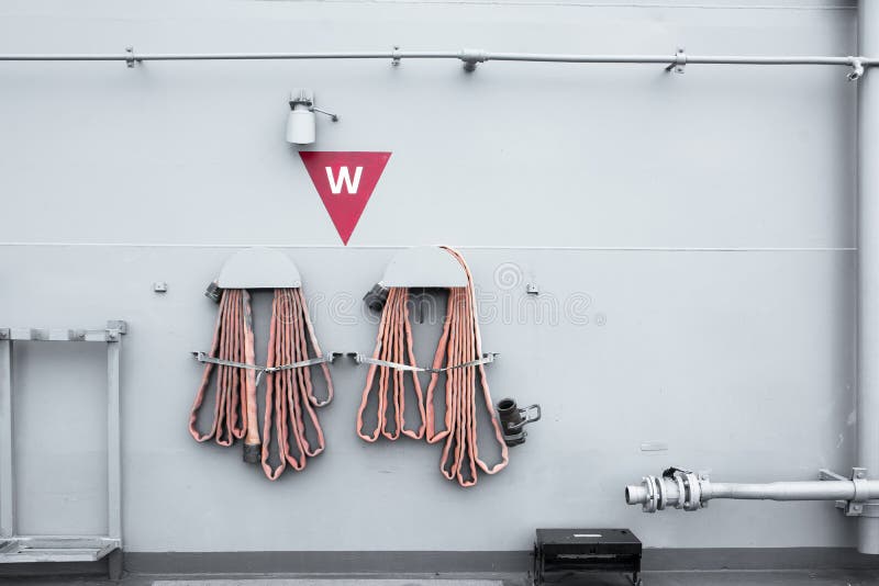 Fire Hose Hanging on the Wall in Battle Ship Stock Image - Image of ...