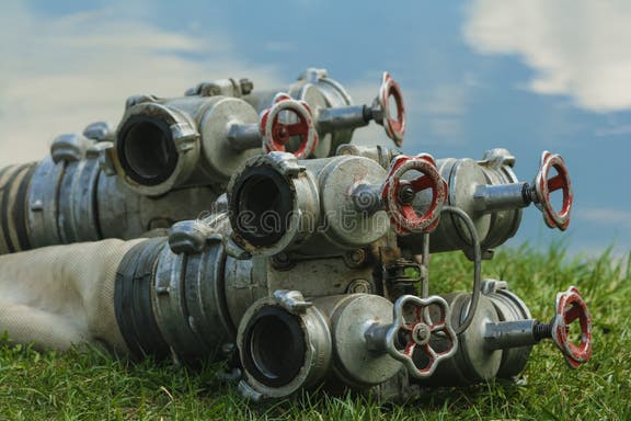 Fire Hoses with Faucets in Nature Stock Image - Image of rescue, device ...