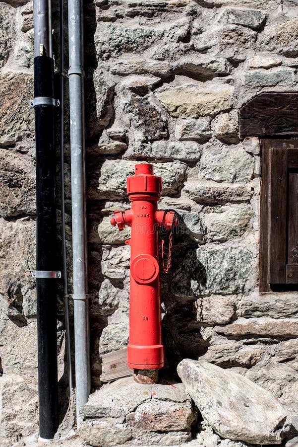 Fire Hydrant in Alpine Scene Stock Photo - Image of danger, hydrant ...