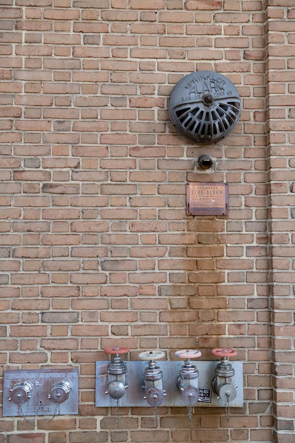 Fire Hydrant in Brick Wall of Building Stock Image - Image of ...