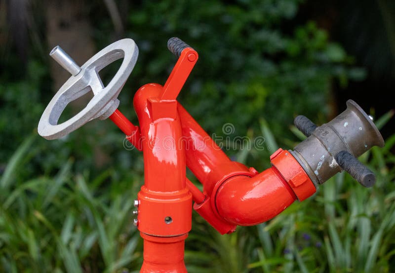 Fire hydrant in the garden stock image. Image of metal - 311386547