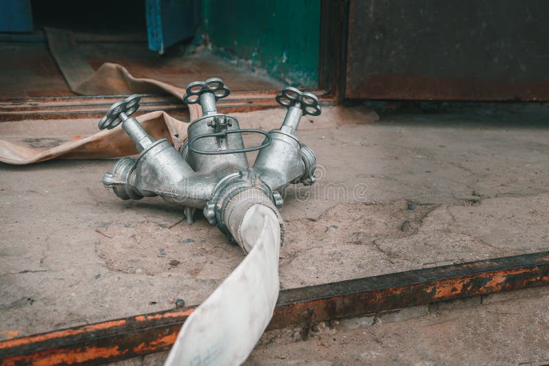 Fire hydrant hose tee stock image. Image of hero, damage - 273158419