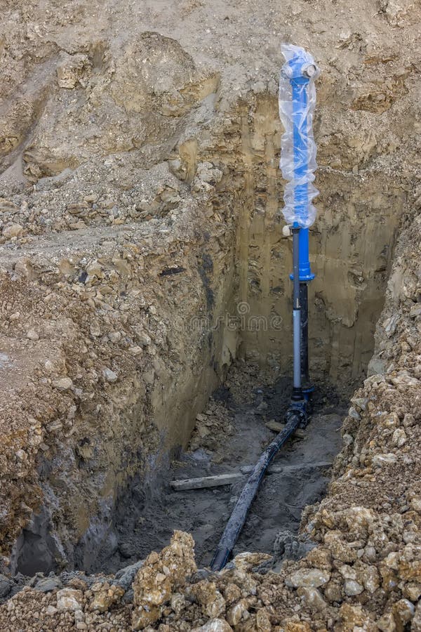 Fire hydrant installation stock image. Image of burn - 48692351