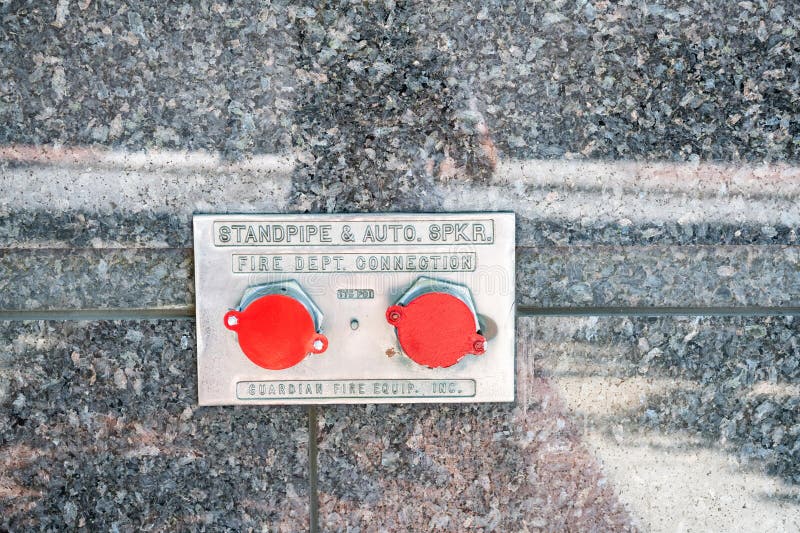 Fire Hydrant in Marble Wall of Modern Building Editorial Photography ...