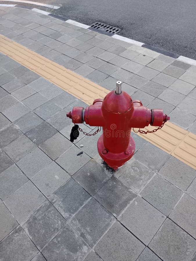 The Fire Hydrant is Outside the Building. Stock Image - Image of iron ...