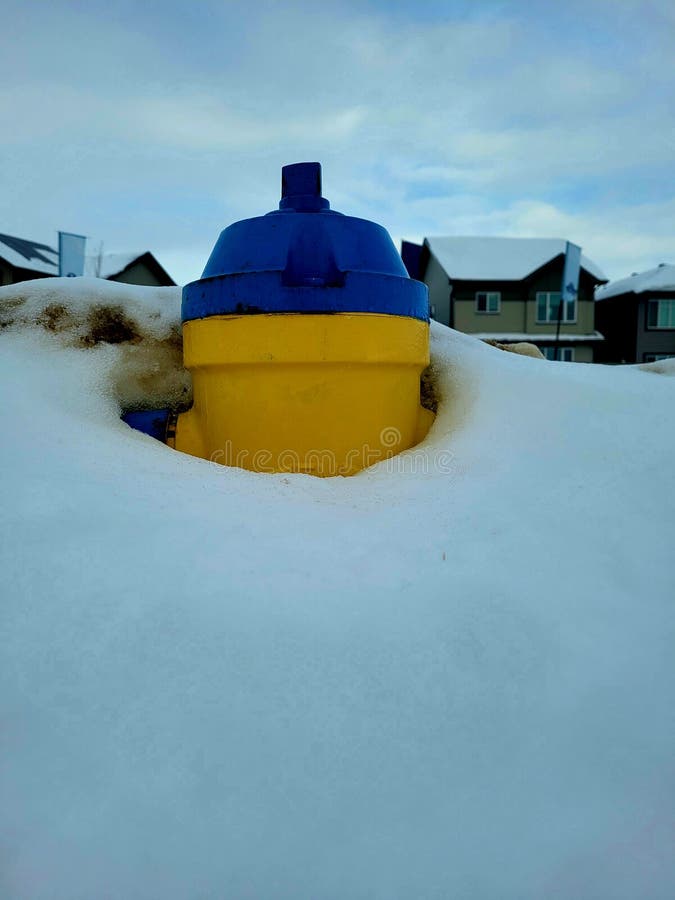 Fire Hydrant Peeking through the Snow Stock Photo - Image of hydrant ...