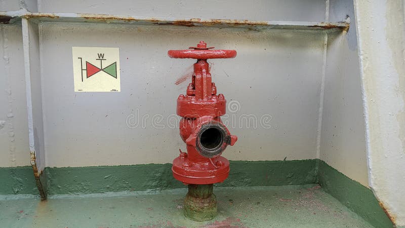 Red Valve Hydrant Is Lock By Key And Chain Stock Image, 52% OFF