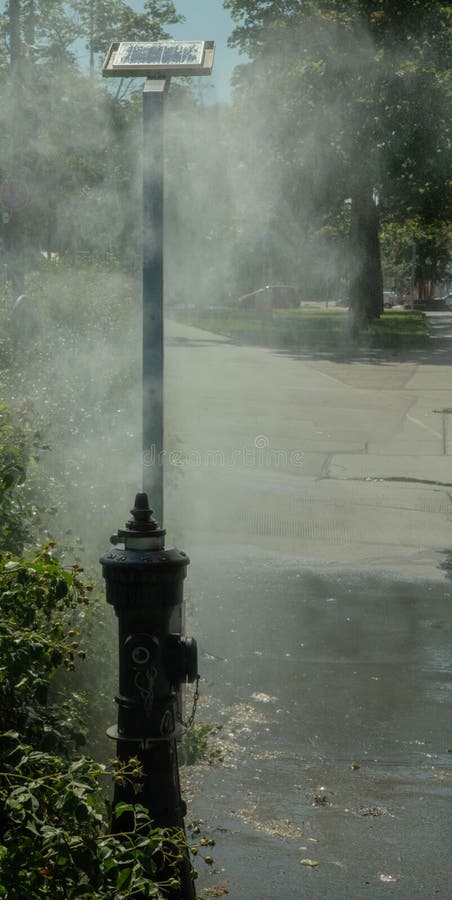 Fire Hydrant and Water Spray Editorial Photo - Image of refreshing ...