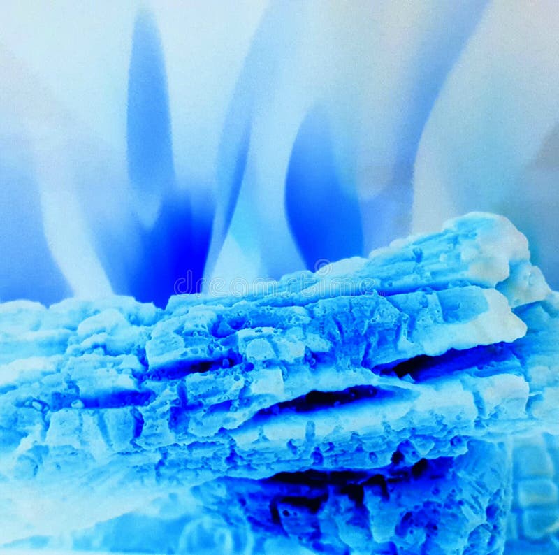 Fire and Ice stock image. Image of logs, glowing, blue - 71890143
