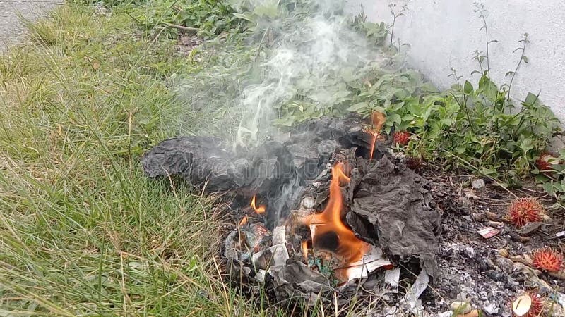 Fire illegal burn plastic stock video. Video of burning - 262247911