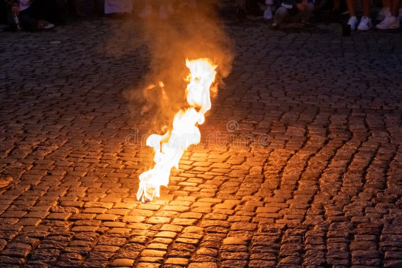 Fire Illuminating Cobblestone Bottom in the Night Stock Photo - Image ...