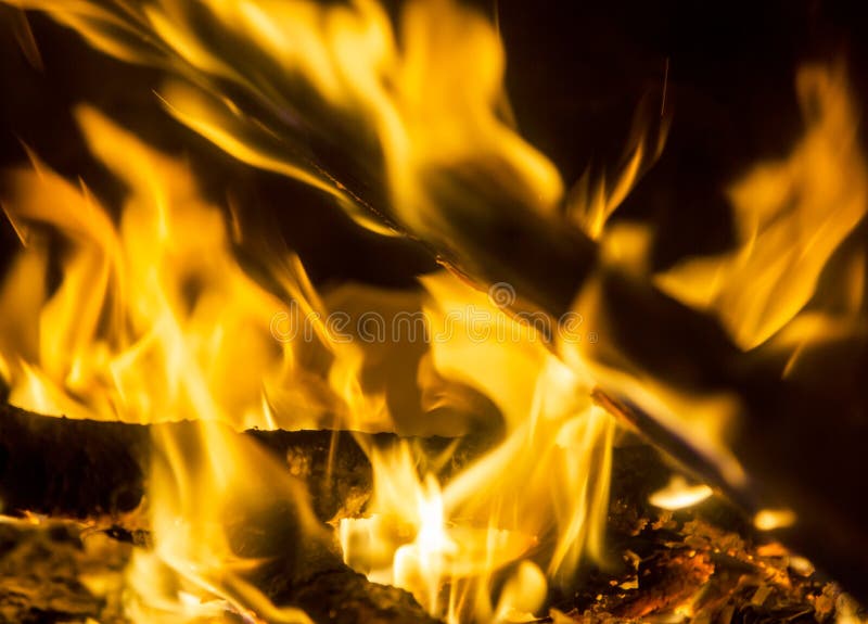 A fireplace burning logs 3 stock photo. Image of burning - 204671378