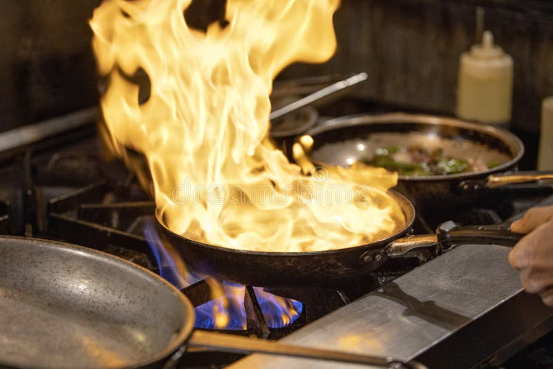 Fire in the Kitchen stock photo. Image of dessert, food - 244154576