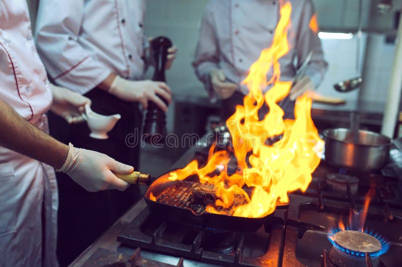 Fire in the Kitchen. Fire Gas Burn is Cooking on Iron Pan,stir Fire ...