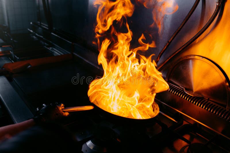 Fire in the Kitchen. Fire in the Pan. Stock Image - Image of hotel ...