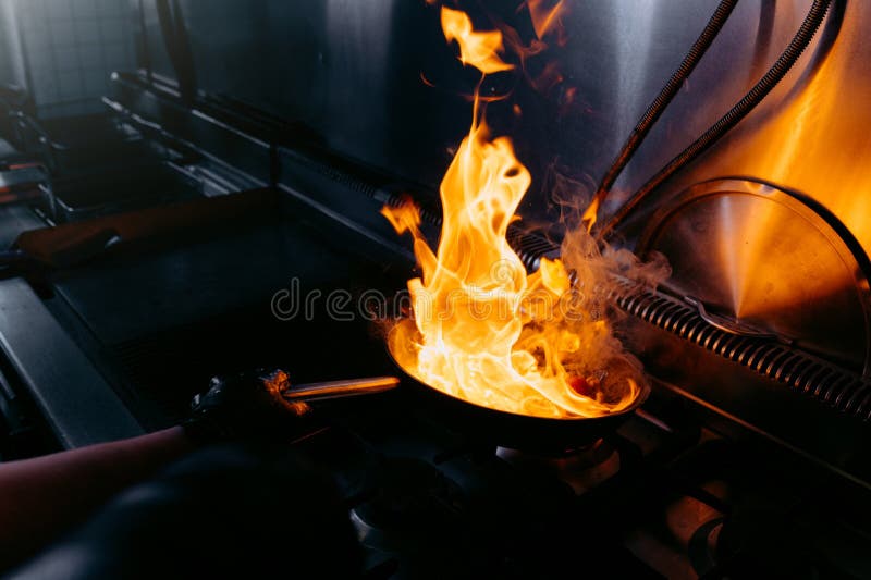 Fire in the Kitchen. Fire in the Pan. Stock Photo - Image of health ...