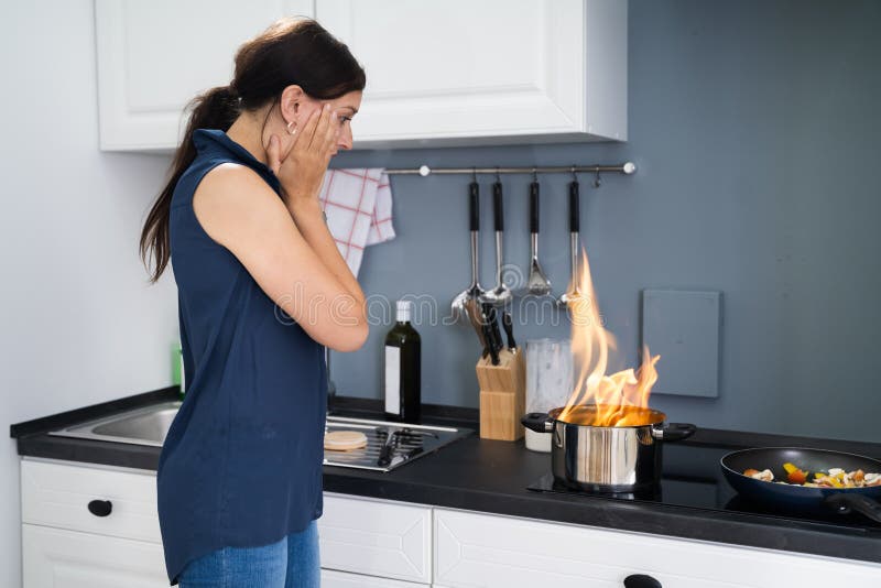 Hot Oil Fire in Kitchen stock photo. Image of awareness - 9577380