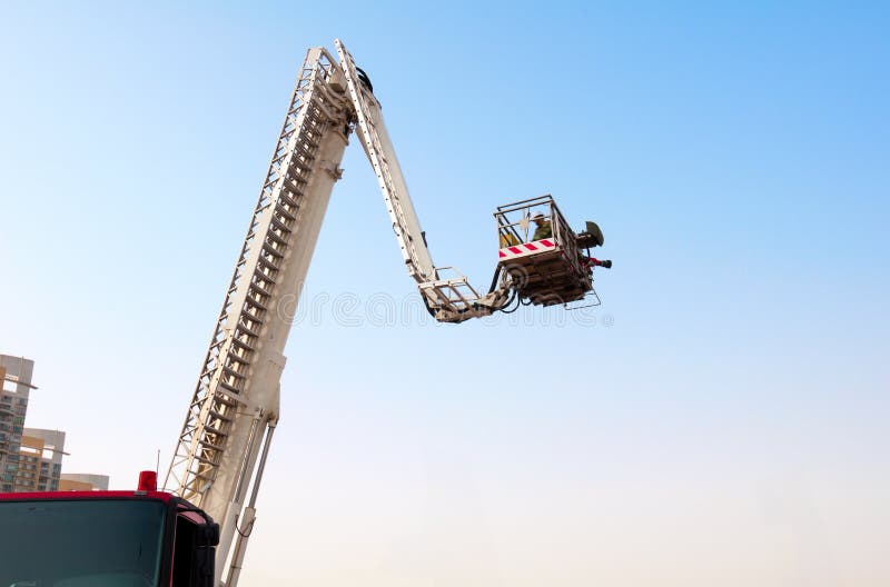 Fire Ladder with Fireman Ontop Stock Photo - Image of service, vertical ...