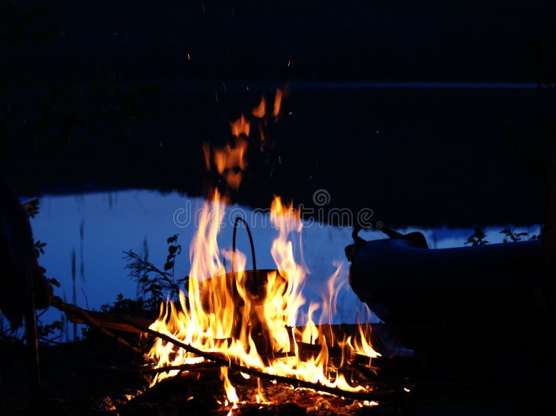 Fire on lake shore stock image. Image of lake, campfire - 10418745