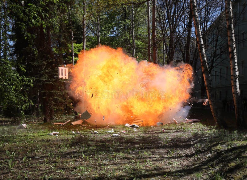 Fire from a Large Explosion between Green Trees Stock Image - Image of ...