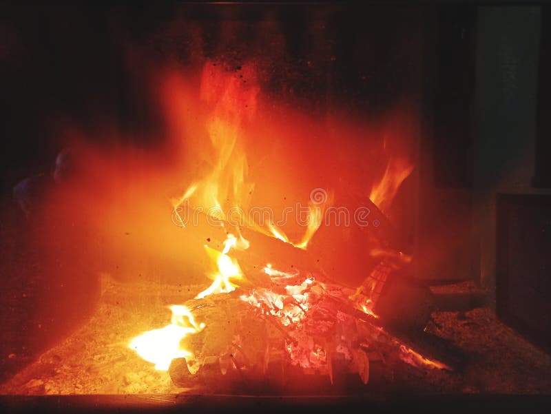 Fire light in fireplace stock photo. Image of fire, darkness - 213269332